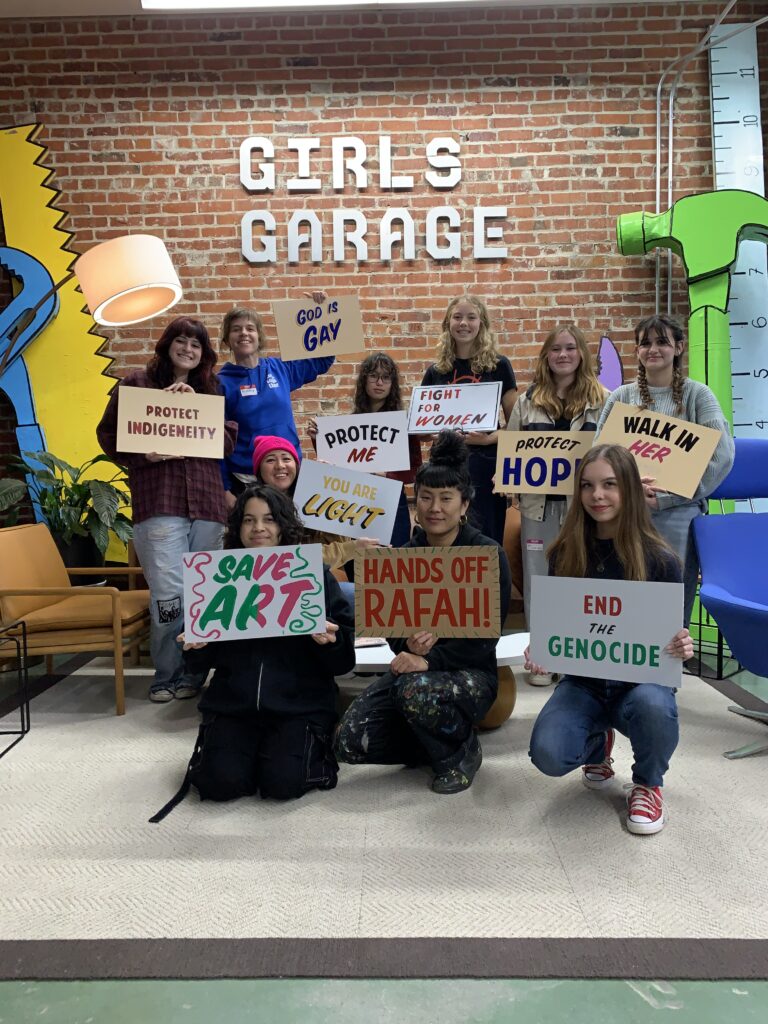 Signs of Solidarity – Girls Garage